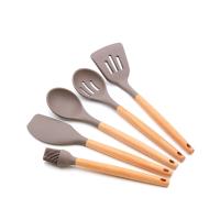 China 7 Piece Silicone Kitchen Utensil Set with Bamboo Handles Nonstick 828g for sale