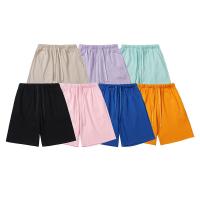 China Breathable Beach Surf Shorts Tide Brand Smiling Face Relaxed Fit Shorts For Men for sale