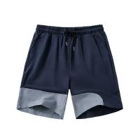 China Men's loose quick drying casual solid color patchwork beach pants for sale