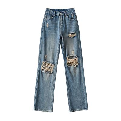 China Factory Customized European Style Fashionable High Waist Woman Ripped Jeans for sale