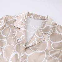 China 2022 Fashion Irregular Printed Long Sleeved Loose Pajama Set For Ladies for sale