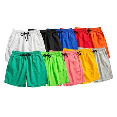 China Summer 95% Polyester Men'S Casual Shorts Candy Color Beach Pants For Men Women for sale