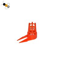China Beekeeping Red Plastic Push In Queen Cell Protector Cage for sale