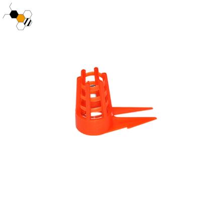 China Beekeeping Red Plastic Push In Queen Cell Protector Cage for sale