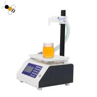 China Stainless Steel Honey Filling Machine 240 Bottles/H Honey Bottling Equipment for sale