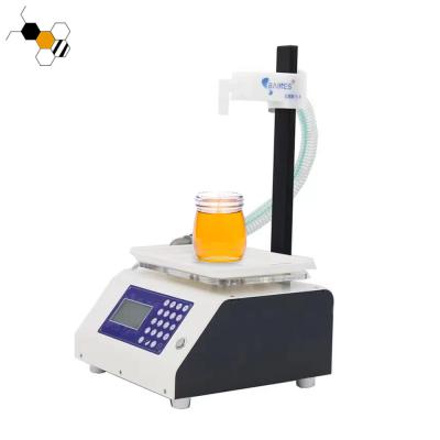 China Stainless Steel Honey Filling Machine 240 Bottles/H Honey Bottling Equipment for sale
