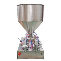 China 220v Double Head Liquid Filling Machine 100ml Honey Bottle Filling Machines for sale