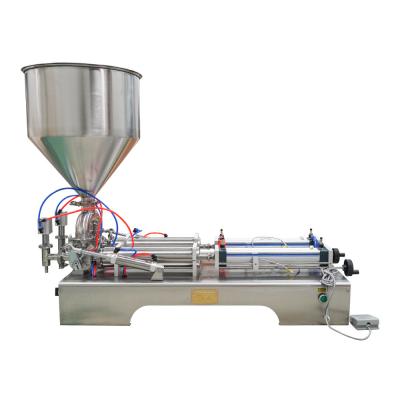 China 220v Double Head Liquid Filling Machine 100ml Honey Bottle Filling Machines for sale