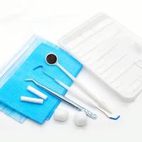China Disposable dental instrument kit with mirror/tweezer/probe/bib//tray good price dental examination kit for sale
