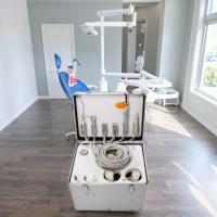 China Dental Suitcase with Suction Unit Mobile Dental Unit With Build in Air Compressor Portable Dental Unit for Students Use for sale