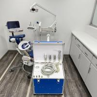 China Mobile Dental Clinic Portable Air Turbine Hand Held Dental Treatment Unit 550W Mobile Dental Delivery Unit for sale