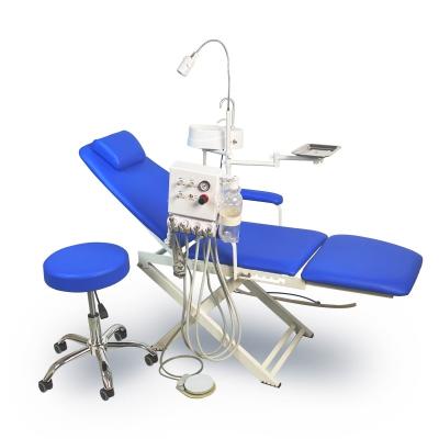 China Folding Portable Dental Chair Unit with Stainless Steel Spittoon Instrument Tray and Movable Light Folding Dental Chair for sale