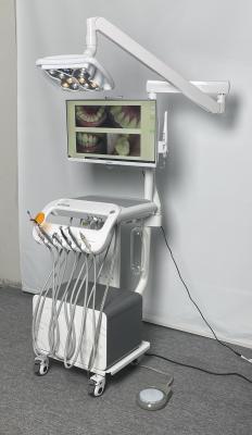 China Portable Dental Workstation with LED Butterfly Whitening Light Integrated Air Water Mobile Dental Cart Autoclavable Silicone Pad for sale
