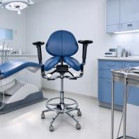 China Luxury Ergonomic Dental Stool with Adjustable Height 360-Degree Rotation and Split Saddle Seat for Clinics for sale