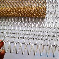 China Jumao Spiral Metal Mesh Curtains - 12m Length, 6-30mm Holes for Space Dividers & Architectural Applications for sale
