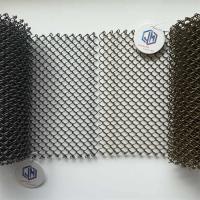 China ODM Coil Architectural Mesh Curtain Metal Panels 0.8-2.5mm Wire for Hotel Space Divider for sale