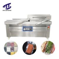 China Maisheng Automatic Industrial Continuous Vacuum Sealer Packing Machine Chicken Feet Sausage Meat Vacuum Packaging Machine for sale