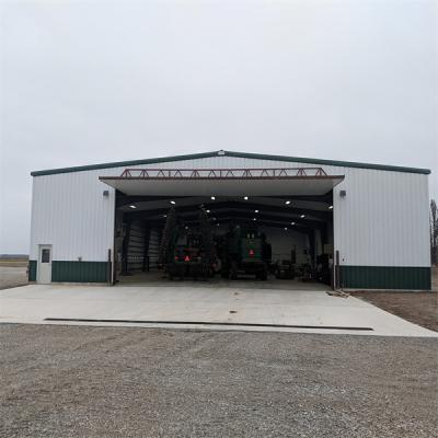 China Welded H Section Steel Structure Warehouse For Slope Roof And Sandwich Panel Wall for sale