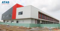 China A large precast steel structure office building with pitched roof and concrete foundation for sale
