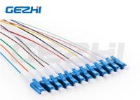 China 1m (3ft) LC UPC Fiber Optic Pigtail 12 Fibers OS2 Single Mode Unjacketed Color-Coded PVC (OFNR) 0.9mm for sale