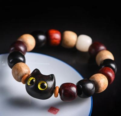 China Small Leaf Red Sandalwood Bracelet Cute Cat Engraved Ebony Wood Protection Bracelet for sale