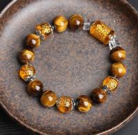 China Adjustable Length Mystical Bracelet Fortune Prosperity Tiger Eye Bead Bracelet for sale