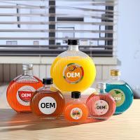 China Food Grade Transparent Beverage Glass Bottle With Aluminum Screw Cap Customizable for sale