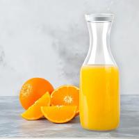 China 500ml 1000ml Narrow Neck Transparent Glass Beverage Bottle With Plastic Lid for sale