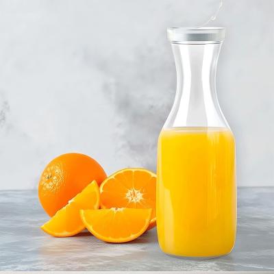 China 500ml 1000ml Narrow Neck Transparent Glass Beverage Bottle With Plastic Lid for sale