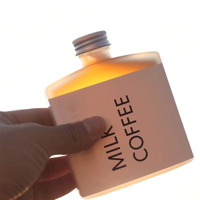 China Flat Square Glass Bottle with Customizable Logo Recyclable for Cold Brew Coffee Juice for sale