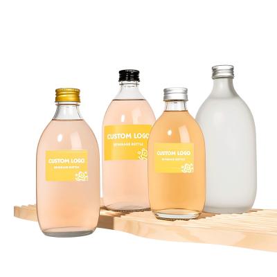 China Durable Juice Tea Beverage Glass Bottle With Cork Lid 250ml 350ml 500ml for sale