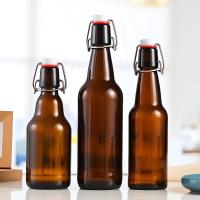 China Amber Glass Kombucha Bottle with Airtight Swing Top for Home Brewing Fermentation for sale