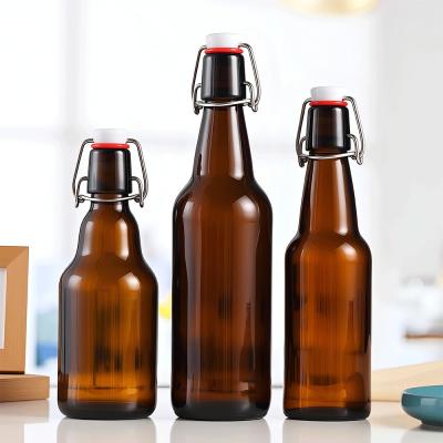 China Amber Glass Kombucha Bottle with Airtight Swing Top for Home Brewing Fermentation for sale