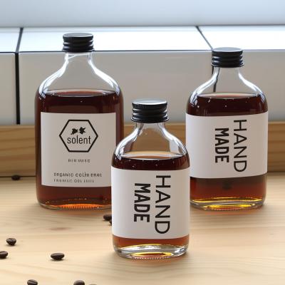 China Refillable Crystal Clear Beverage Glass Bottle 50ml - 350ml With Screw Cap Lid for sale