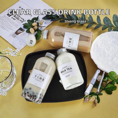 China Wide Neck Empty Beverage Glass Bottle 350ml 500ml For Coffee Juice Milk for sale