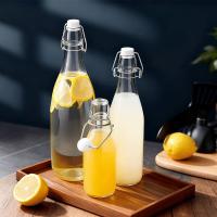 China Crystal Clear Swing Top Glass Bottle with Airtight Lid 60ml to 1000ml Capacities for sale