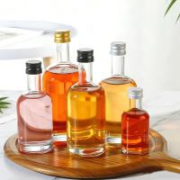 China Round Thick Bottom Extra Flint Clear Liquor Glass Bottle For Vodka Whiskey Gin for sale