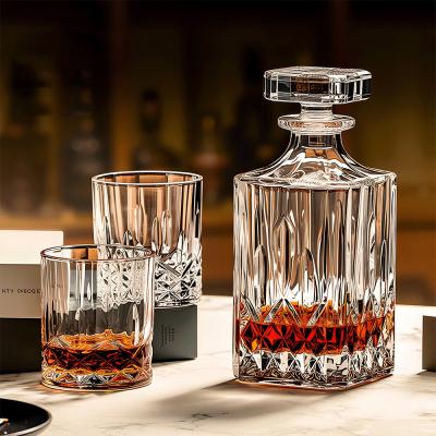 China Luxury Lead Free 700ml Square Engraved Whisky Glass Bottle With Glass Stopper Cork for sale