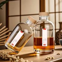 China Clear Frosted Glass Bottle With Round Cylinder Shape Screw Cap For Wine Liquor Storage for sale