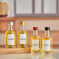 China 50ml Mini Liquor Glass Bottle With Screw Cap Custom Logo For Vodka Whiskey Wine for sale