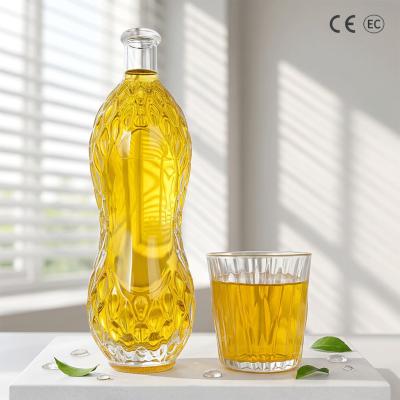 China Peanut Shape Transparent Reusable Custom Glass Bottles 500ml 750ml 1L For Wine Liquor Spirit Alcohol for sale