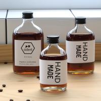 China Flat Flask Glass Bottle with Aluminum Cap for Cold Brew Coffee Juice Wine Liquor 50ml 100ml 200ml 250ml 350ml for sale