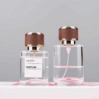 China Square Shape Glass Scent Bottle With Leather Cap 100ml Empty Perfume Spray Bottle for sale