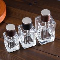 China Portable Square Perfume Glass Bottle 15ml 30ml 50ml 100ml With Heavy Bottom Sprayer Round Lid for sale