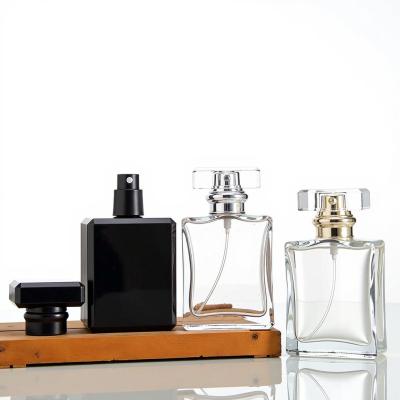 China Custom Square Perfume Glass Bottle Refillable Glass Perfume Atomiser With Pump Sprayer for sale