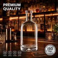 China 750ml High Flint Glass Vodka Bottle With Carved Sunburst Base Liquor Decanter for sale