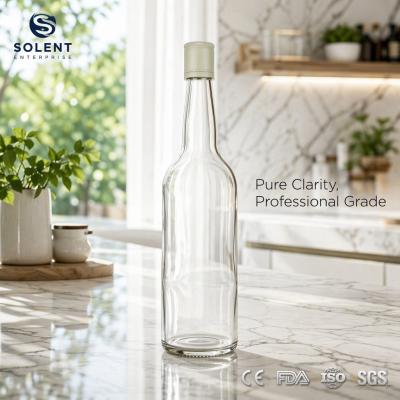 China Long Neck Cylindrical Glass Bottle With Screw Cap For Beverage Storage for sale