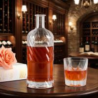China Solent Luxury Spiral Diamond Cut High Flint Glass Liquor Bottle With 3D Relief Patterns For Spirits for sale