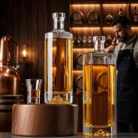 China Solent Luxury 3D Mountain Relief High Flint Transparency Glass Liquor Bottle With Rubber Stopper for sale