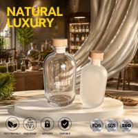 China Solent Luxury Round Frosted Clear Glass Bottle With Wooden Cork Stopper High Flint Material For Wine Liquor for sale